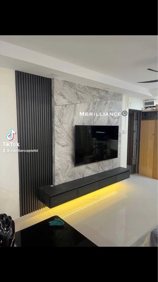 Fluted panel feature wall tv console with stainless steel lining strips ...