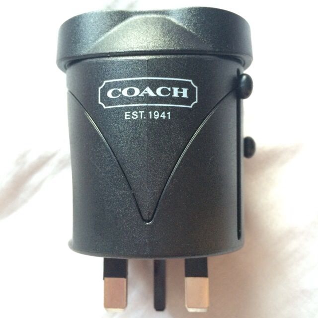 Coach travel Adapter, Luxury on Carousell