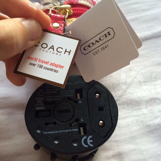 Coach travel Adapter, Luxury on Carousell