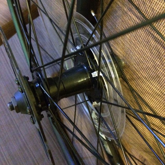 Alloy double-wall rims laced to Giant Tracker Sport hubs with stainless ...