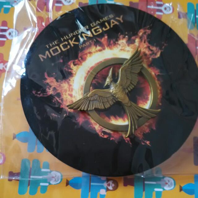 HUNGER GAMES PIN, Everything Else on Carousell