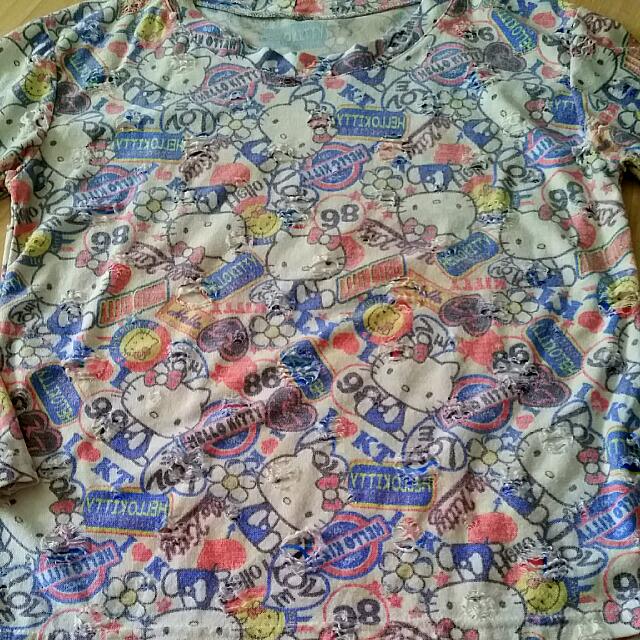 Ripped Hello Kitty Shirt , Women's Fashion, Tops, Shirts on Carousell