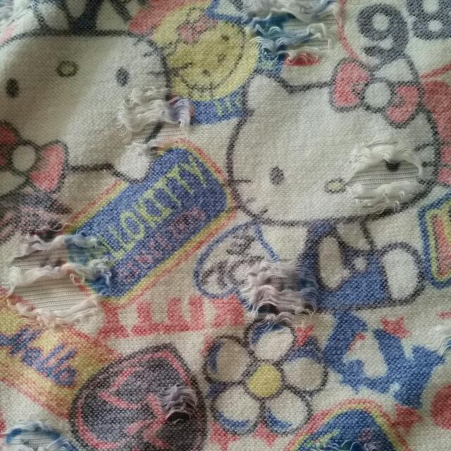 Ripped Hello Kitty Shirt , Women's Fashion, Tops, Shirts on Carousell