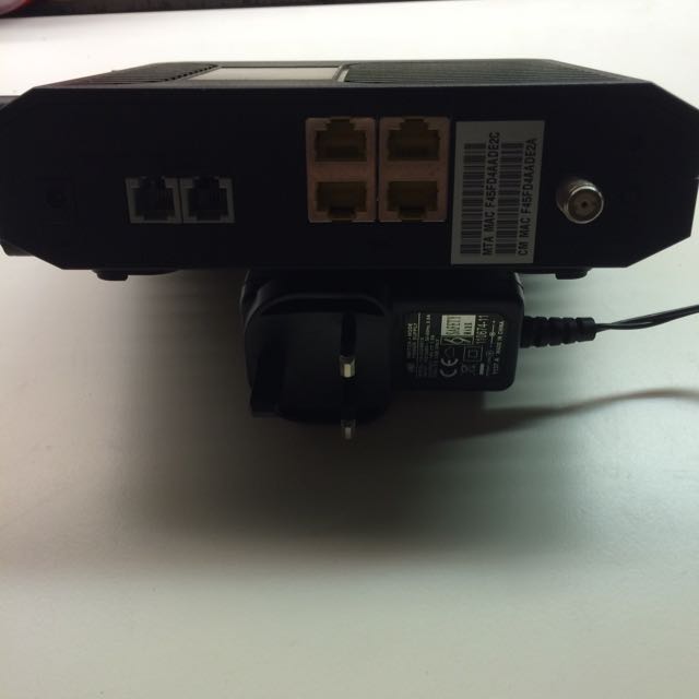 Cisco Cable Modem And Broadband Wireless Router With Voice, Computers ...