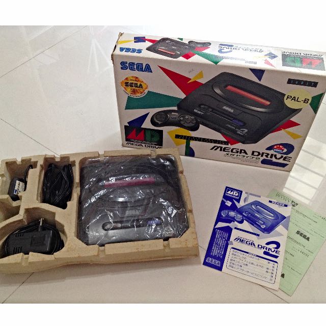 SEGA GENESIS MEGA DRIVE 2 CONSOLE WITH TWO CONTROLLERS, GAMES AND SUPER MEGA KEY - Now reduced ...
