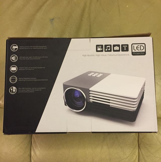 Mini Led Projector... Bought At $180... Unused..... Letting Go At $100 ...