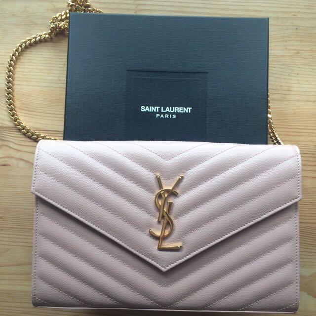 YSL envelope clutch in pink, Luxury, Bags & Wallets on Carousell