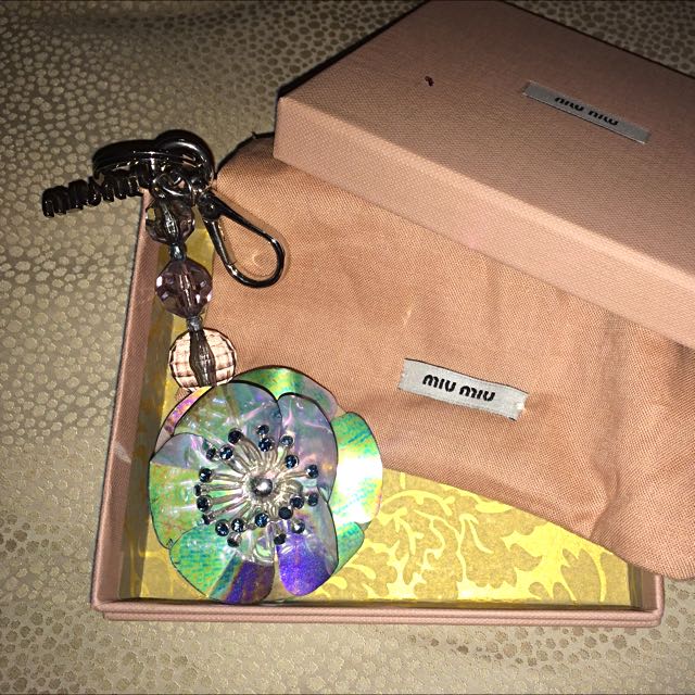 Miu Miu Swarovski Crystal Flower Keychain, Luxury, Accessories on Carousell