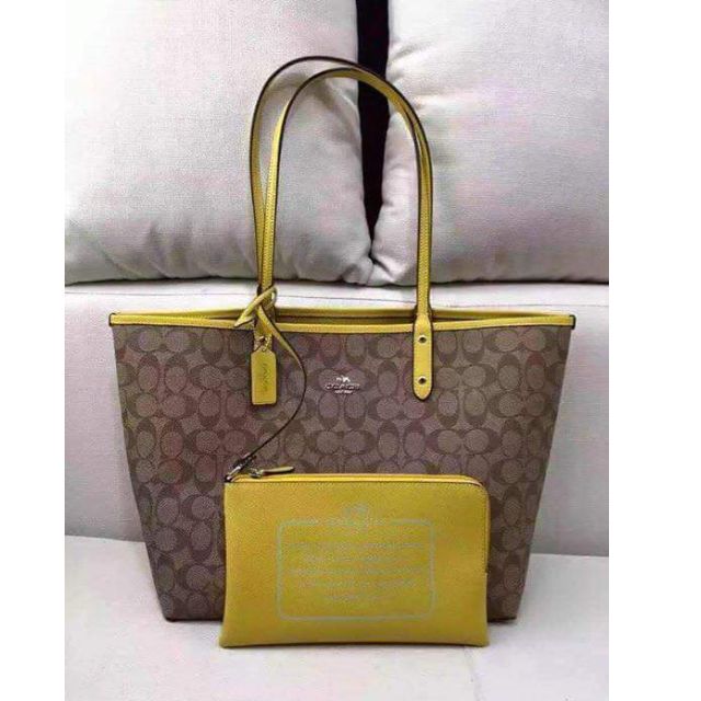 Authentic Coach Signature Reversible, Luxury, Bags & Wallets on Carousell