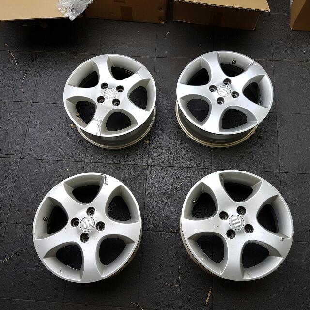 Original Suzuki Swift 15 Inch Rims. PCD 4X100, Car Accessories on Carousell