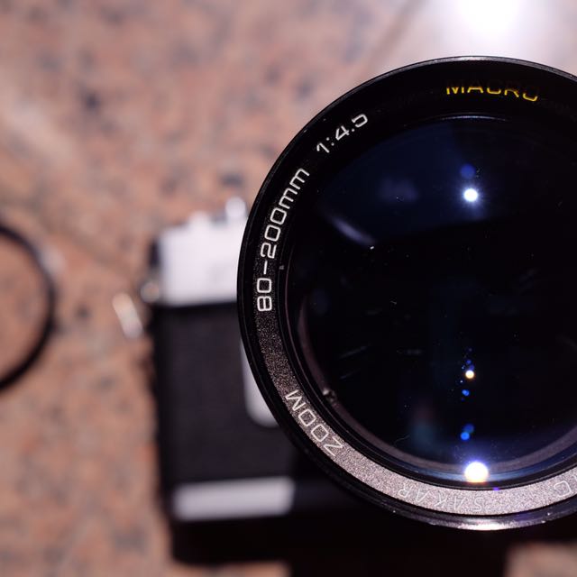 Canon FX with a Sakar MC Zoom 80-200mm f/4.5 Lens Vintage 35mm Film ...