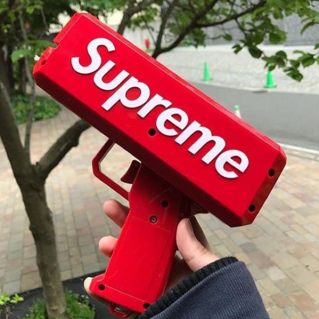 Supreme Money Gun, Men's Fashion, Watches & Accessories, Accessory ...