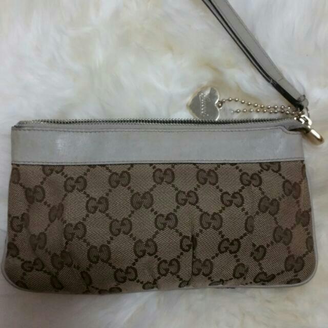 Gucci Wristlet, Luxury, Bags & Wallets on Carousell