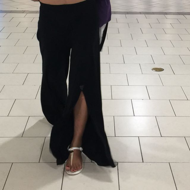 black squarepants with slit on left side, Women's Fashion, Bottoms ...