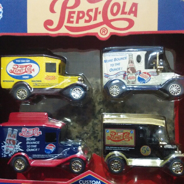 4 antique Pepsi Cola Die cast cars in a box. These cars are custom ...