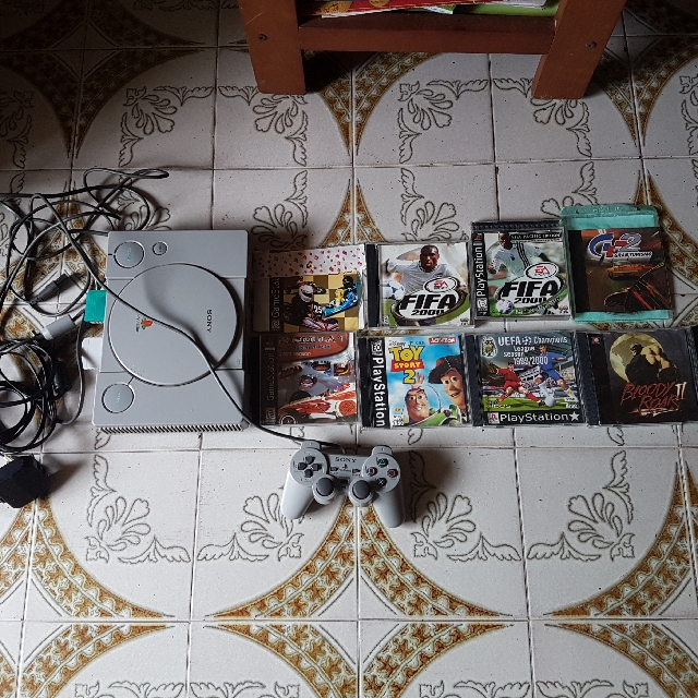 Old PlayStation console with game, Video Gaming, Video Game Consoles ...