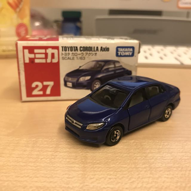 Tomica #27 Toyota Corolla Axio, Hobbies & Toys, Toys & Games on Carousell