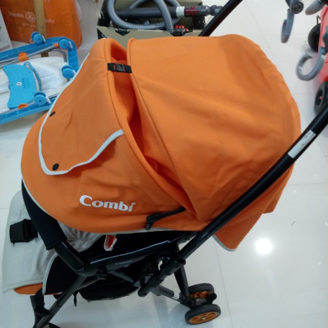 Combi stroller orange, Babies & Kids, Going Out, Strollers on Carousell