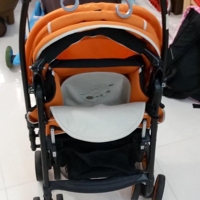 Combi stroller orange, Babies & Kids, Going Out, Strollers on Carousell