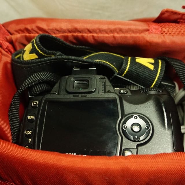 Nikon D60 with red Tenba camera Bag, charger, lens and memory card ...