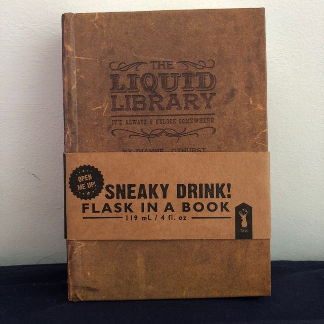 Flask in a book on Carousell