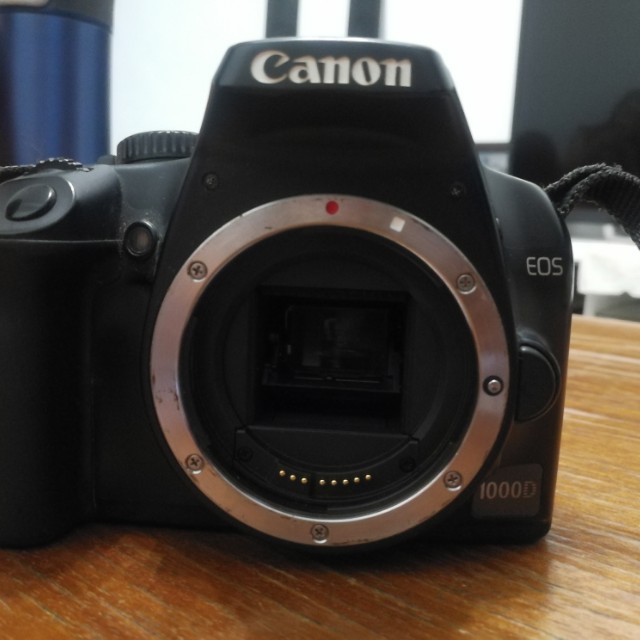Canon 1000D (shutter spoilt), Photography, Cameras on Carousell