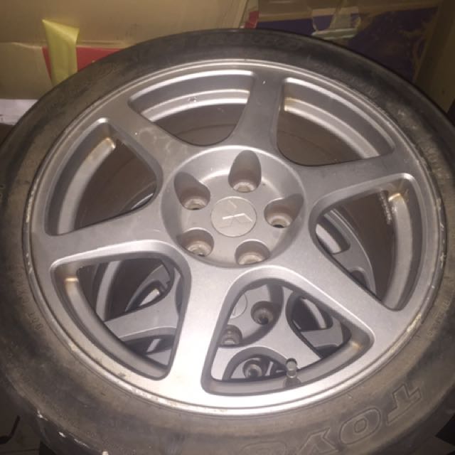 Evo 8 stock enkei rims, Car Accessories on Carousell