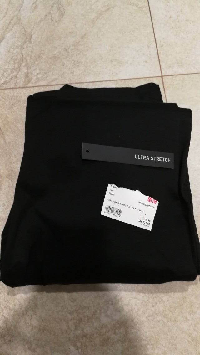 Uniqlo ultra stretch pants black 88 cm, Men's Fashion, Bottoms, Trousers on Carousell
