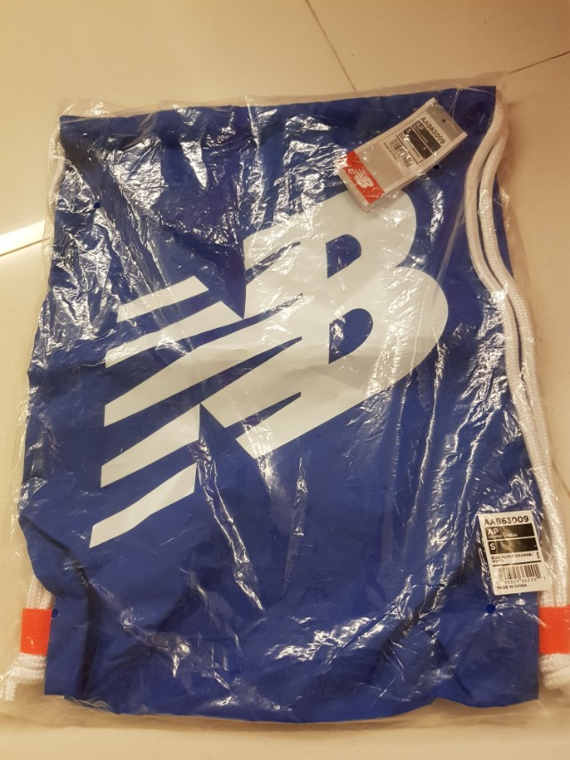 New Balance drawstring bag, Men's Fashion, Bags, Belt bags, Clutches ...