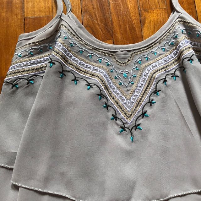 Grey tribal flutter top, Women's Fashion, Tops, Sleeveless on Carousell