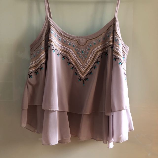 Grey tribal flutter top, Women's Fashion, Tops, Sleeveless on Carousell