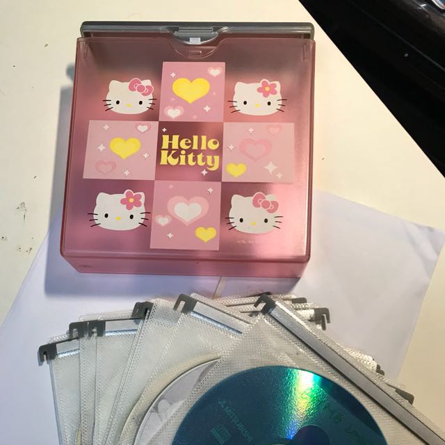 Hello Kitty Disc holder, 興趣及遊戲, 旅行, 旅遊 - 旅行必需品及用品 - Carousell