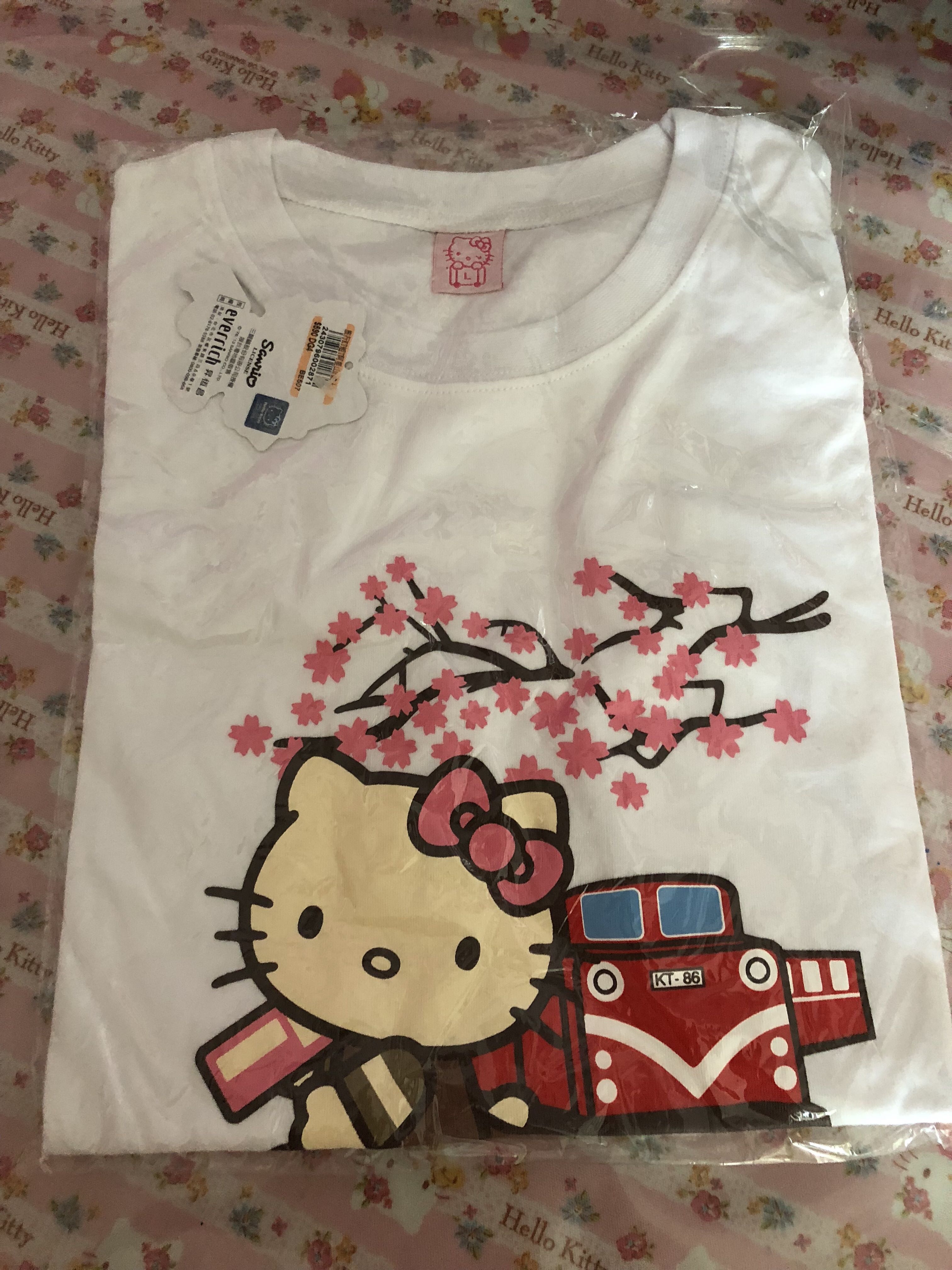 Hello Kitty top, Women's Fashion, Tops, Blouses on Carousell