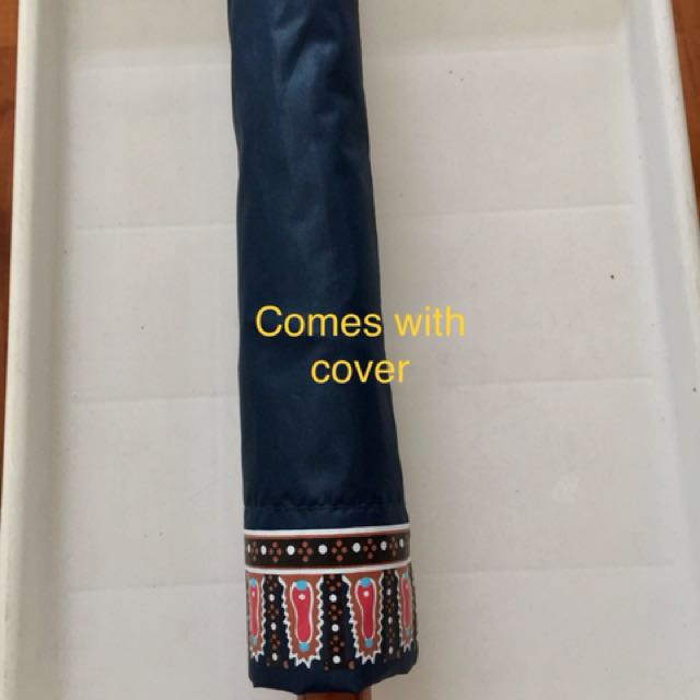 SIA umbrella with logo & batik design & matching cover, Furniture ...