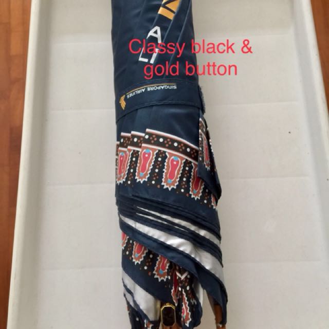 SIA umbrella with logo & batik design & matching cover, Furniture ...