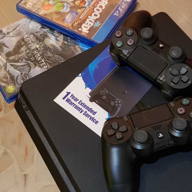 PS4 slim 500GB w Monster Hunter World + Overcooked + 2 controllers ...