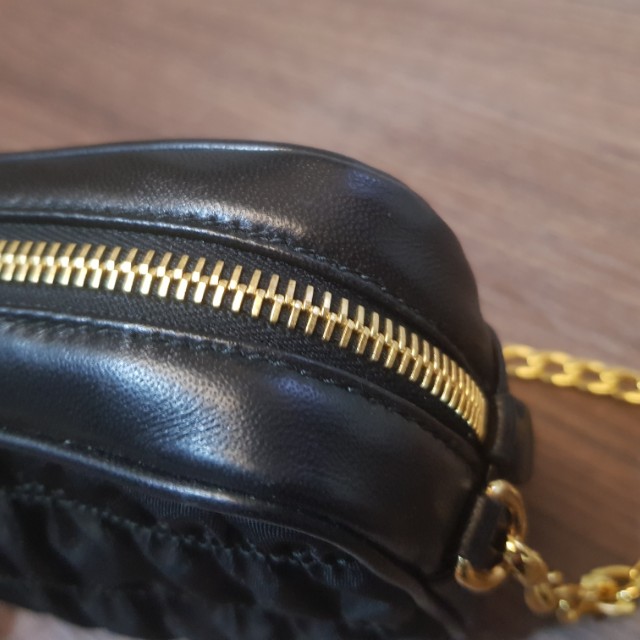 Prada small sling bag, Luxury, Bags & Wallets on Carousell