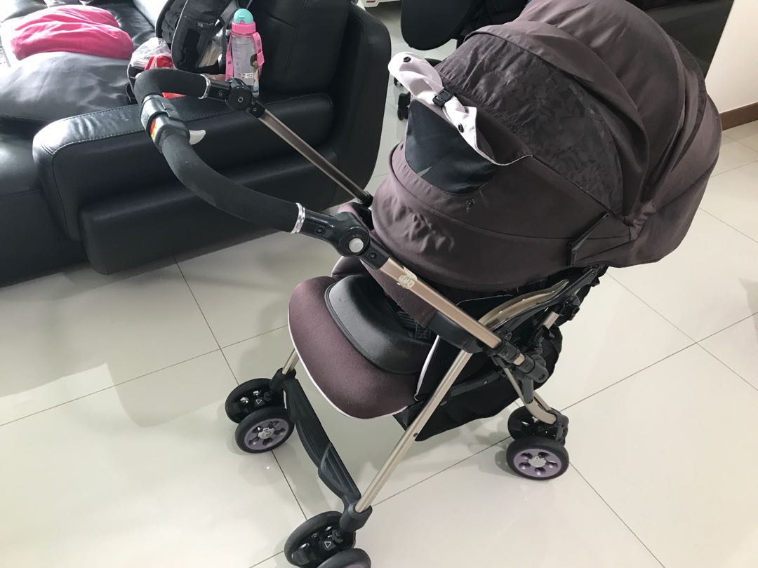 Combi Miracle Turn Premier stroller -purple leaf, Babies & Kids, Going ...