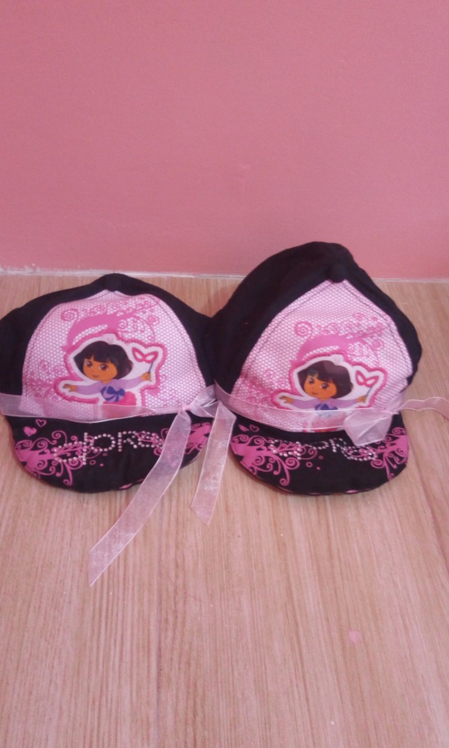 Dora caps, Babies & Kids, Babies & Kids Fashion on Carousell