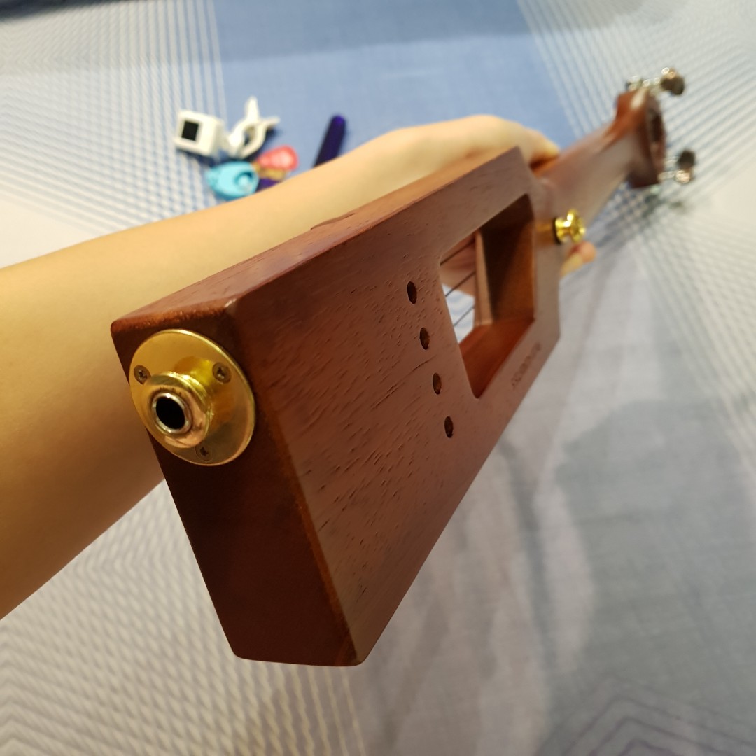 Yuan silent electric travel ukulele (RISA stick alike), Hobbies & Toys ...