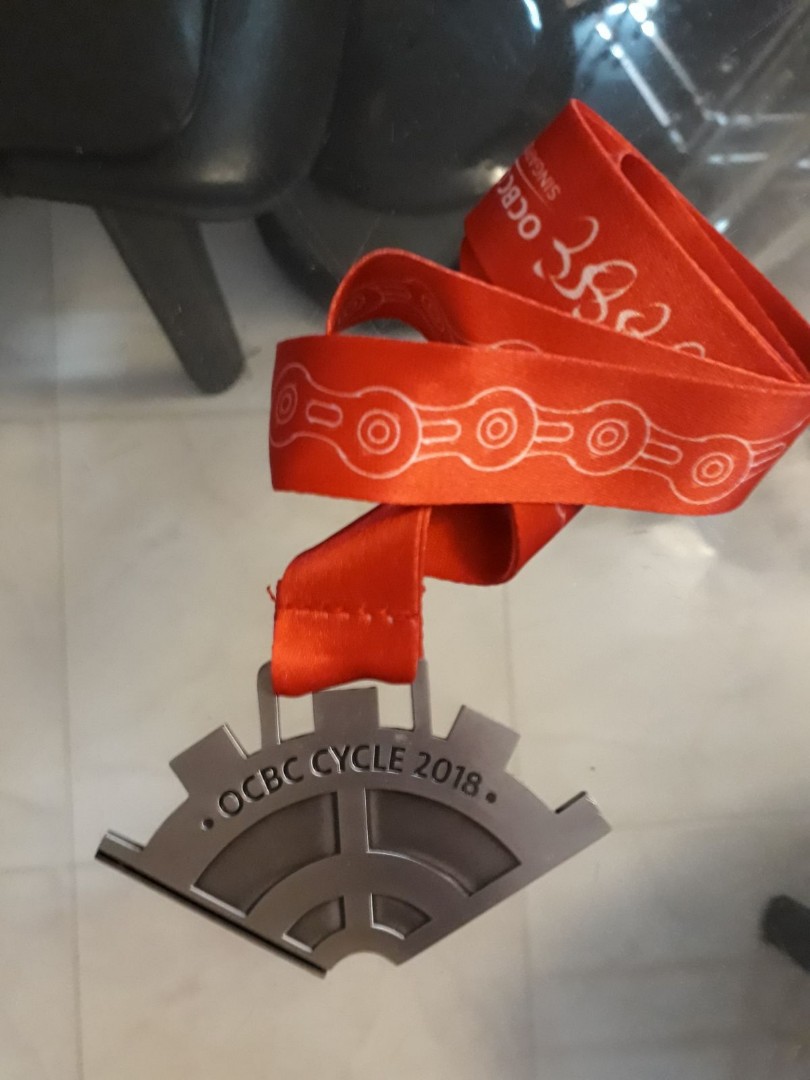 OCBC cycle 2018 medal, Men's Fashion, Activewear on Carousell