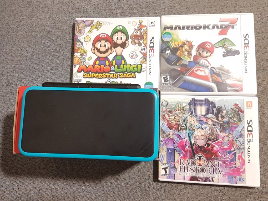 New Nintendo 2DS XL with warranty comes with games Mario Kart & Mario ...