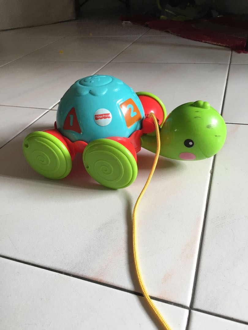 Fisher Price pull along turtle, Babies & Kids, Infant Playtime on Carousell