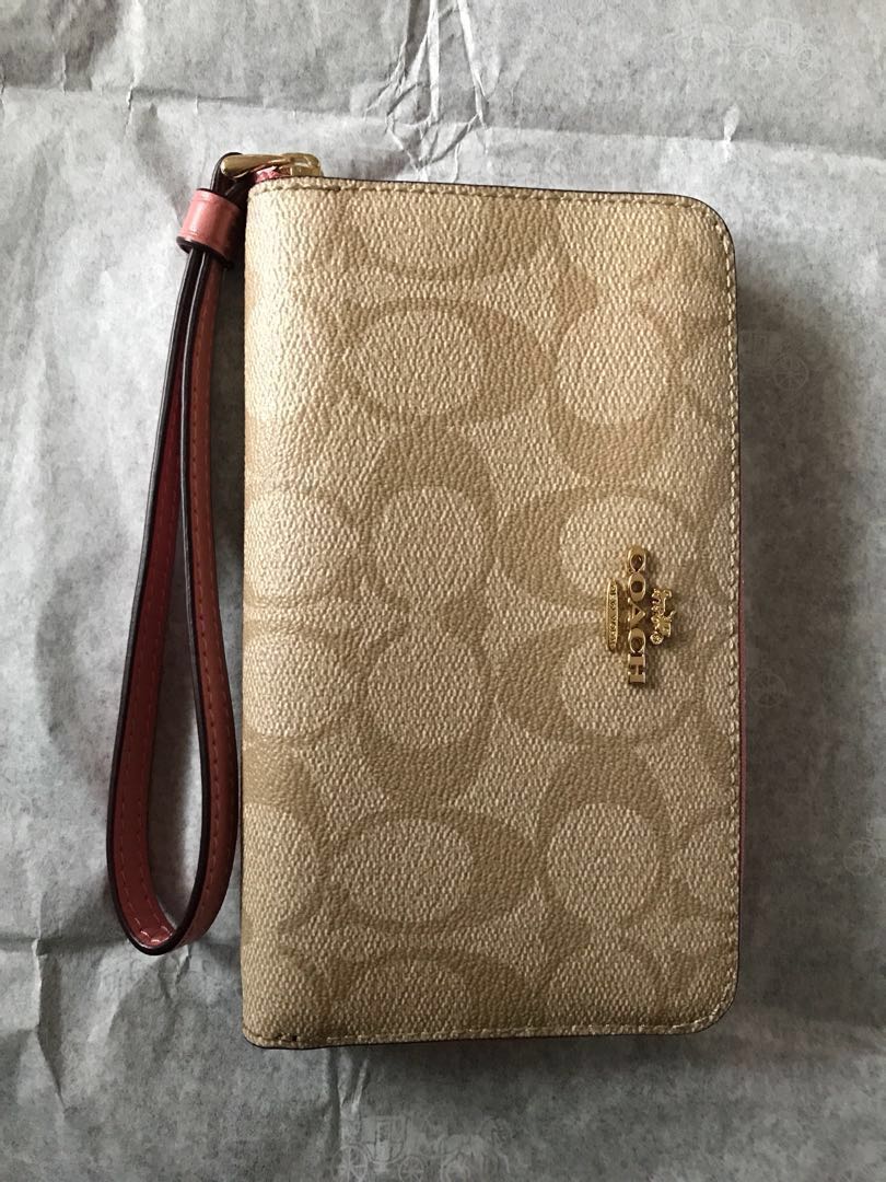 Coach phone wallet in signature coated canvas, Women's Fashion, Bags ...