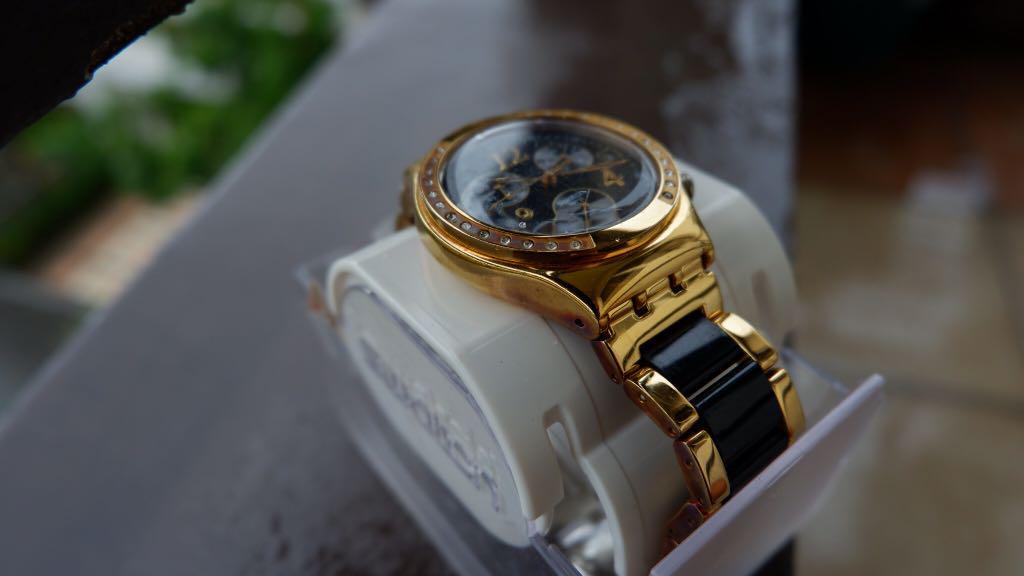 Swatch Gold Black Dress Watch on Carousell