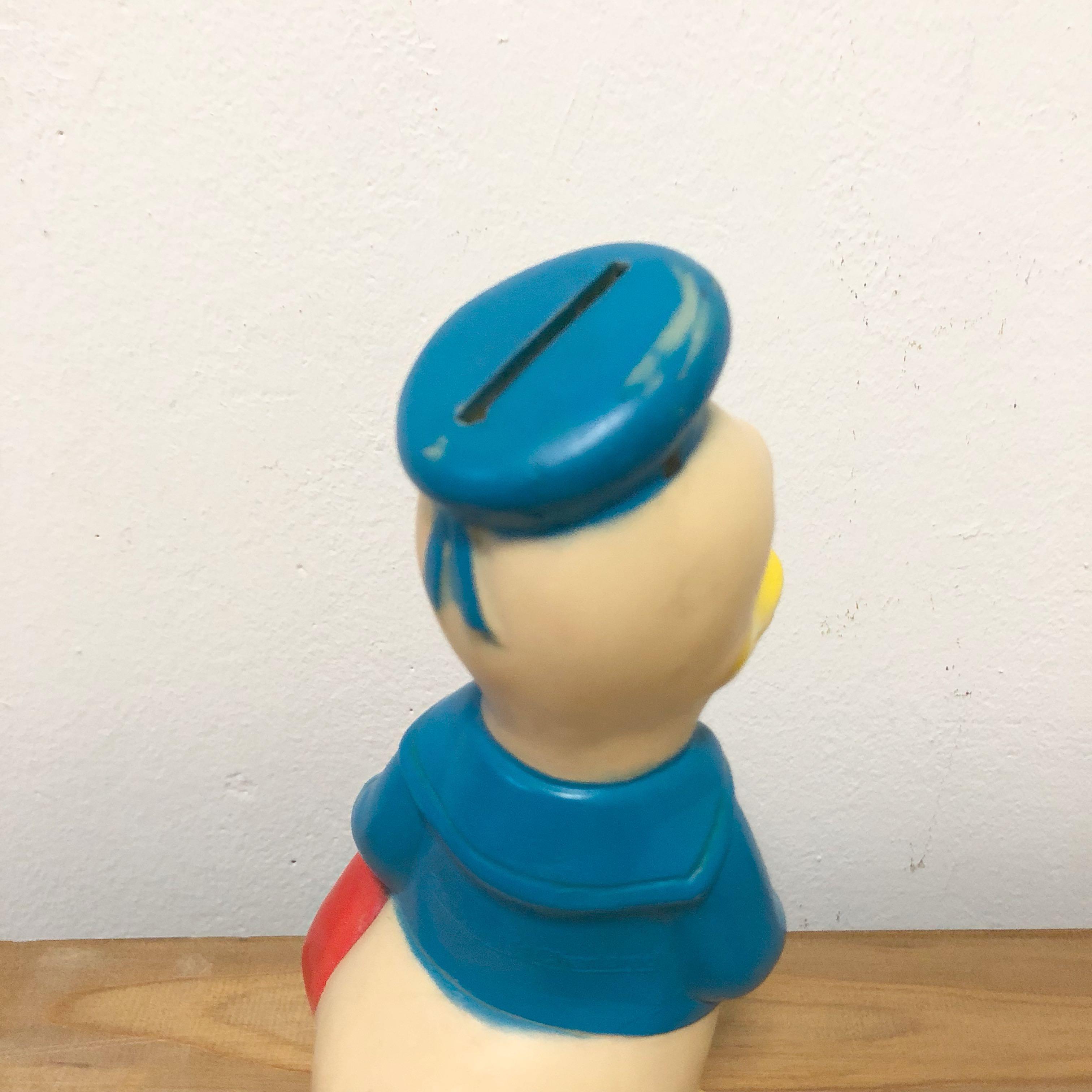 Vintage standard chartered bank plastic Donald Duck coin bank, Hobbies ...
