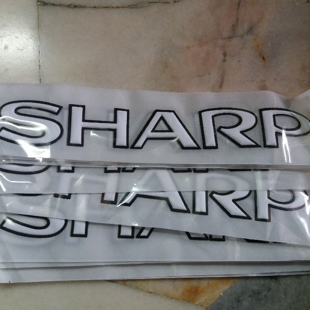 manchester united sponsor sharp, Men's Fashion, Activewear on Carousell