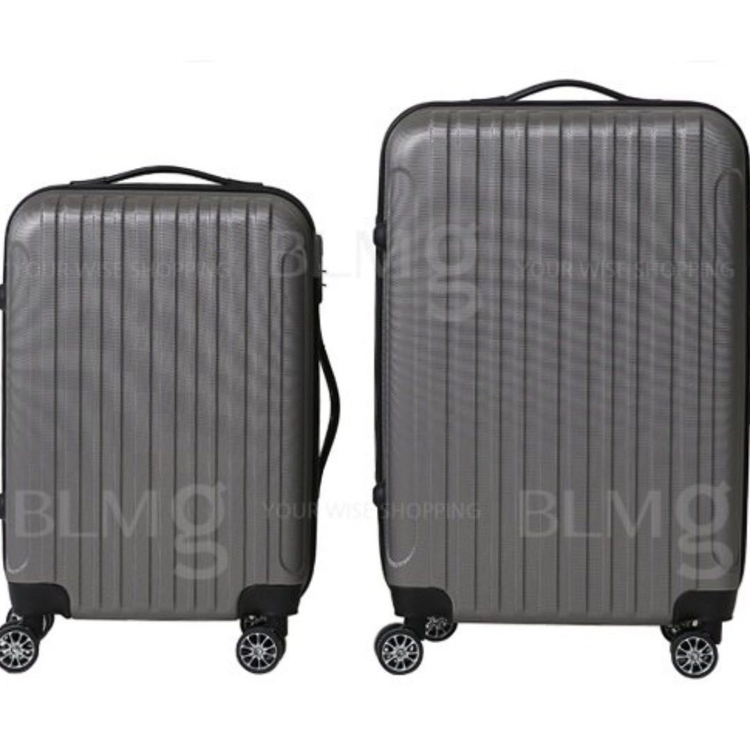 20 & 24” travelling grey spinner luggage, Hobbies & Toys, Travel ...