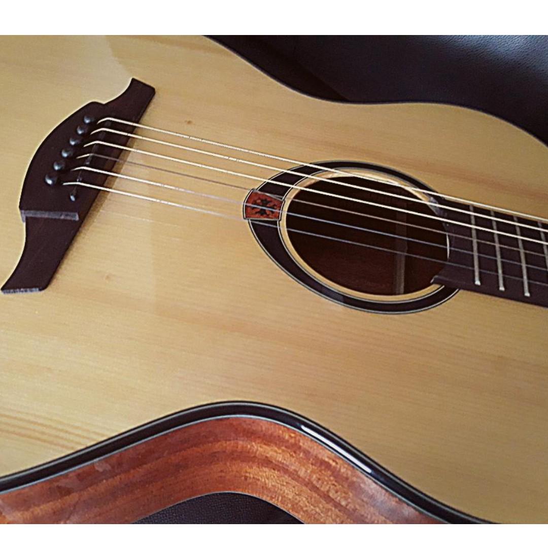 Brand new LAG Acoustic guitar with stand, bag and guitar strings ...