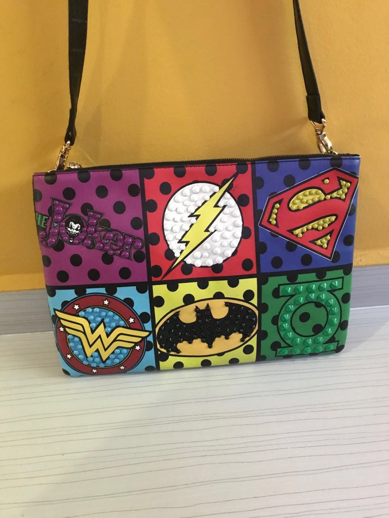 DC comic sling bag, Women's Fashion, Bags & Wallets, Cross-body Bags on ...
